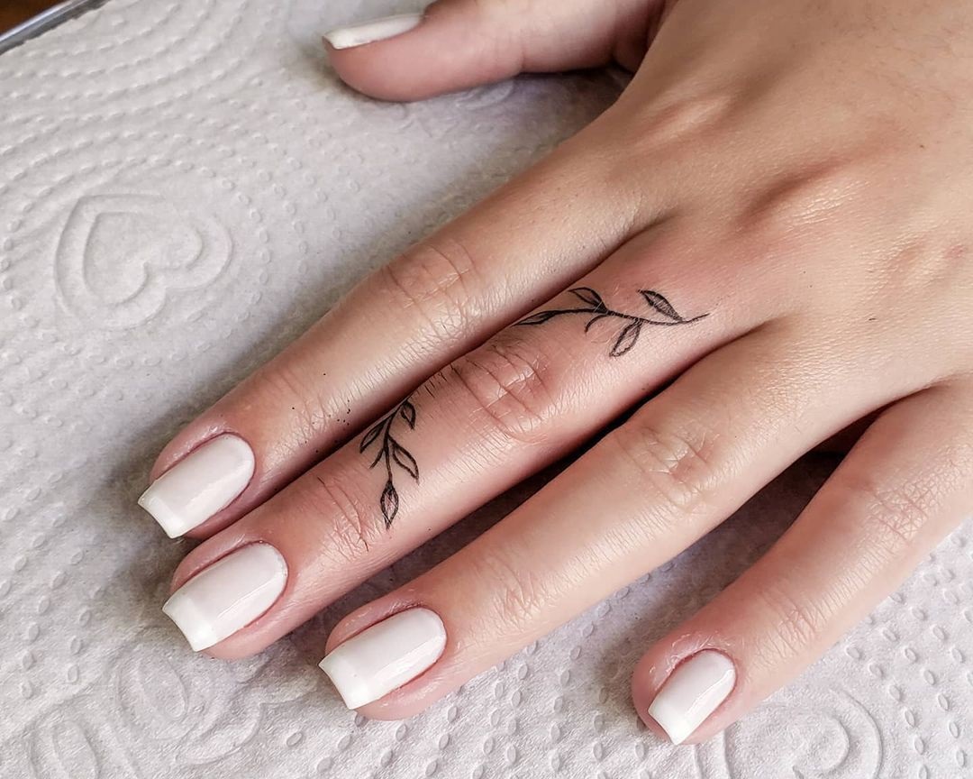 Small Tattoo On Finger
